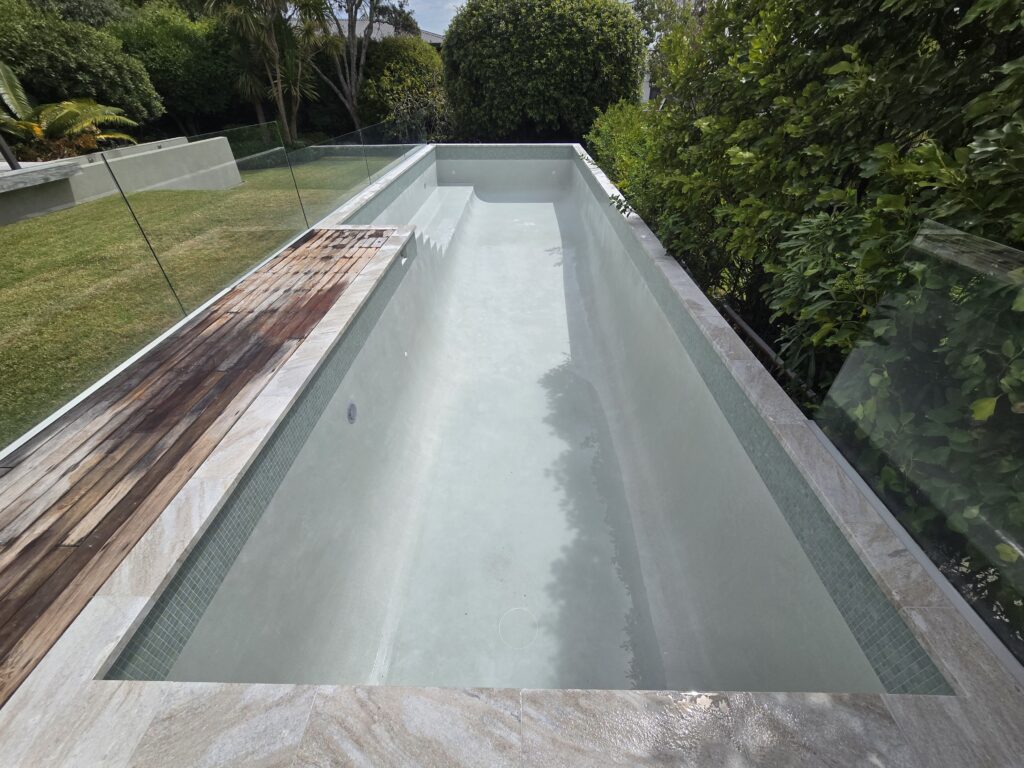 Zen Garden Pool Renovation by Artisan Stone & Tile